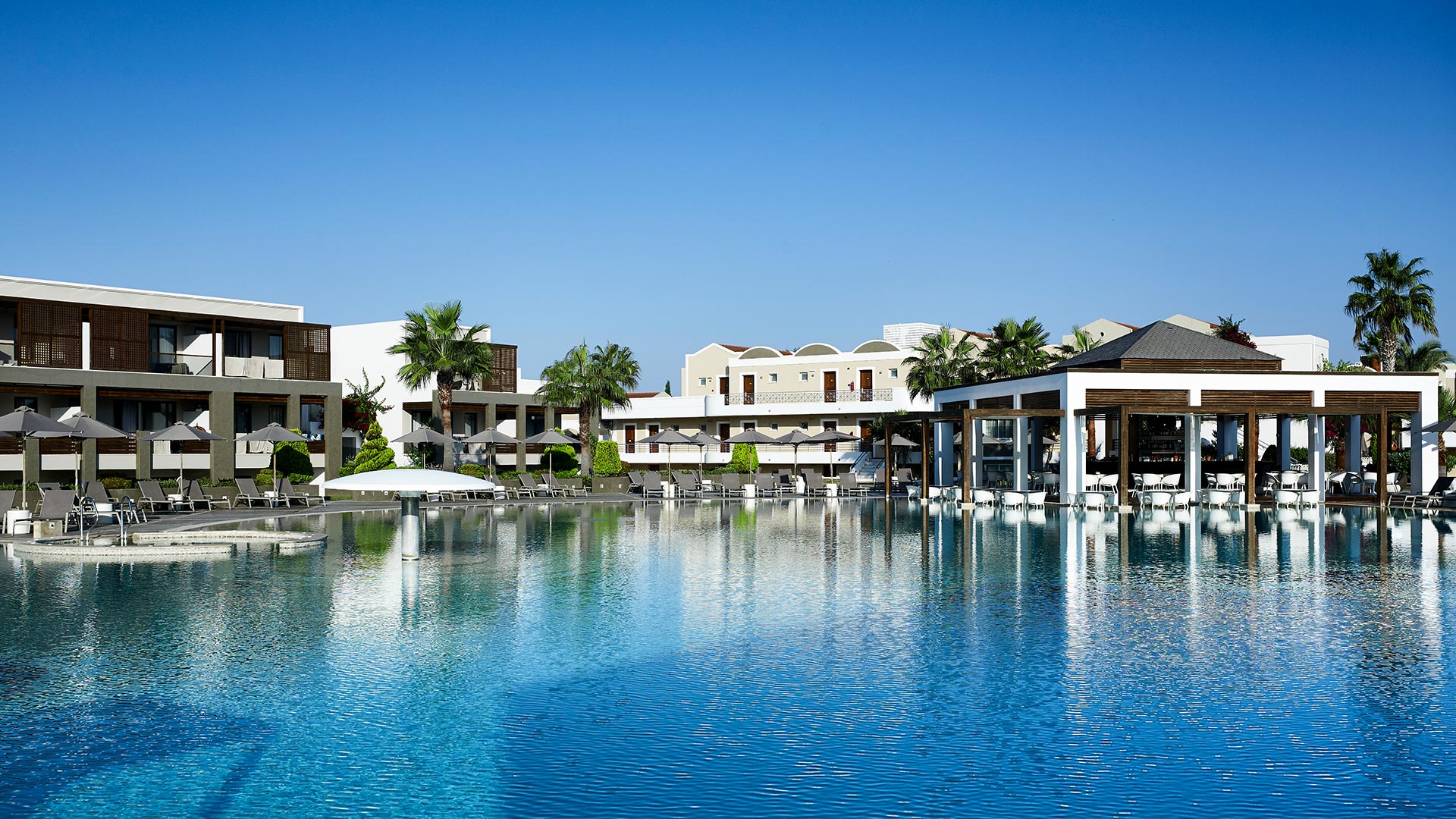 Pelagos Suites Hotel & Spa – Modern oasis, perfect for family vacation ...